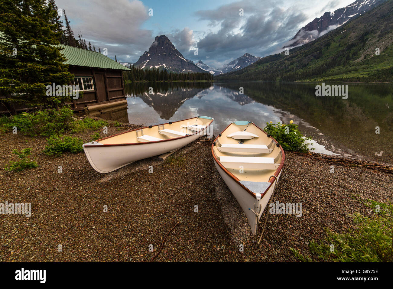 Beached canoes at Two Medicine Lake at Glacier National Park in West ...