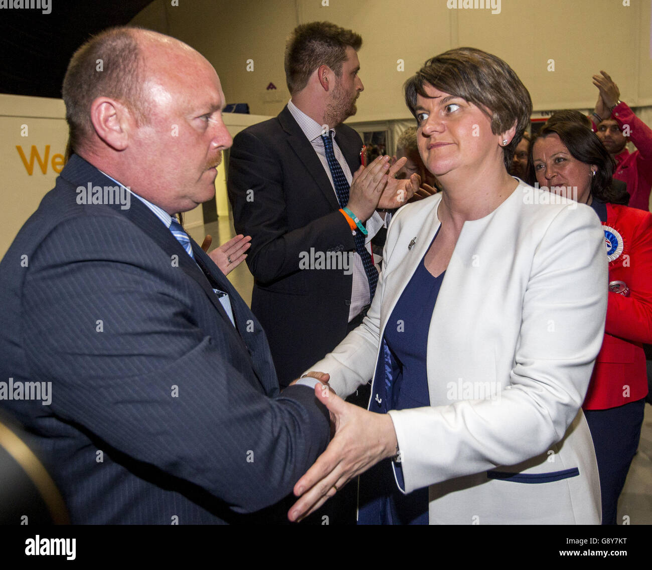 Defeated DUP Belfast West candidate Frank McCoubrey being consoled by ...