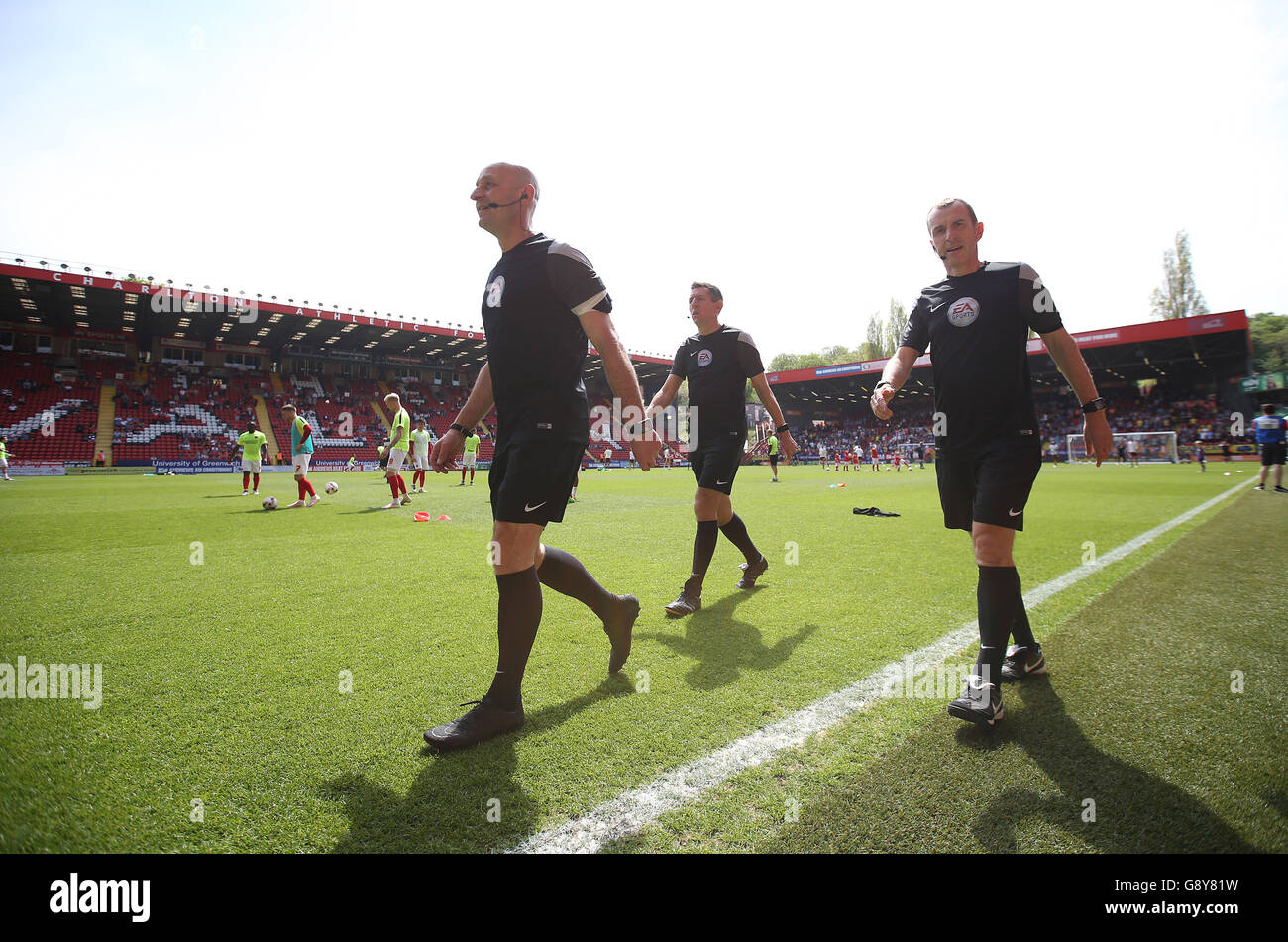 Referee Roger East and assistance referee Derek Eaton and Andrew ...