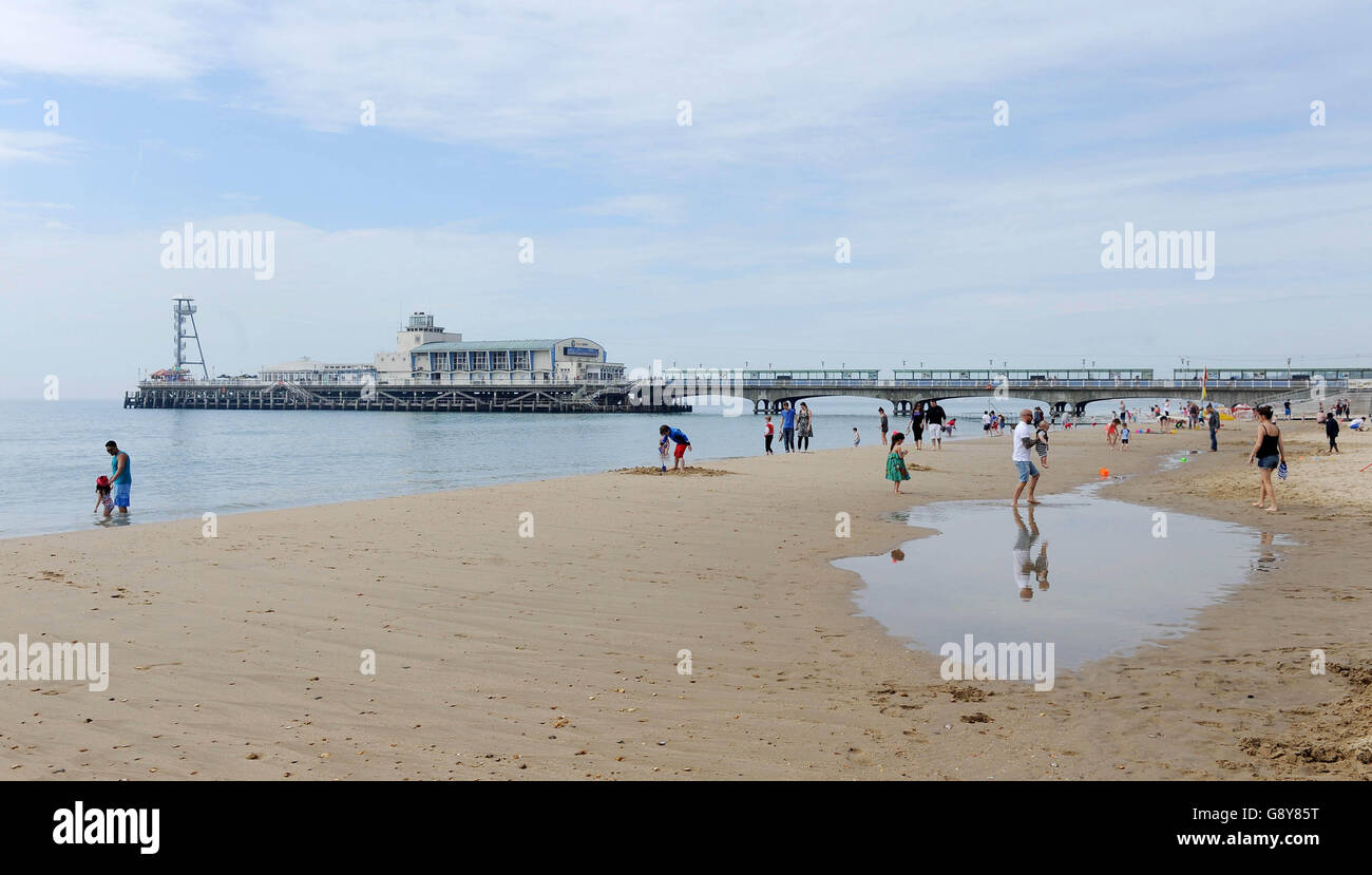People enjoying the warm weather in front of Bournemouth Pier on ...