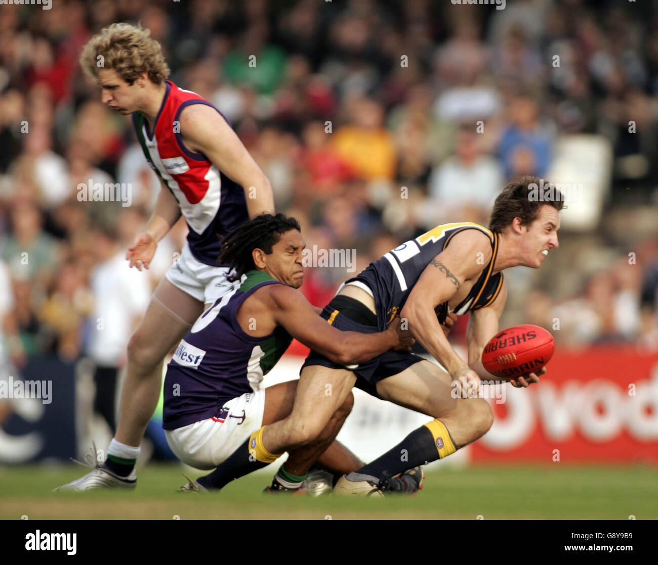 Fremantle dockers troy cook west coast eagles matthew rosa hi-res stock ...
