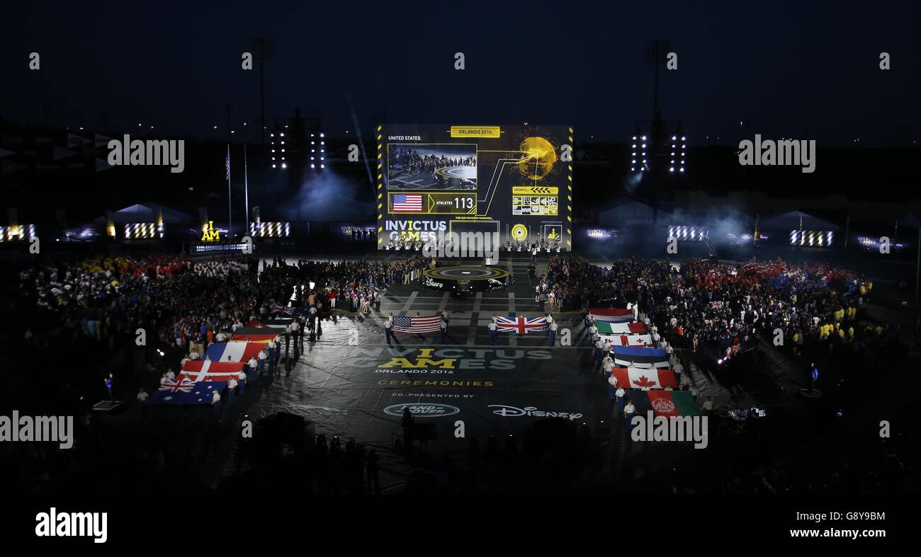 Thenations flags and athletes enter the arena during the opening ...