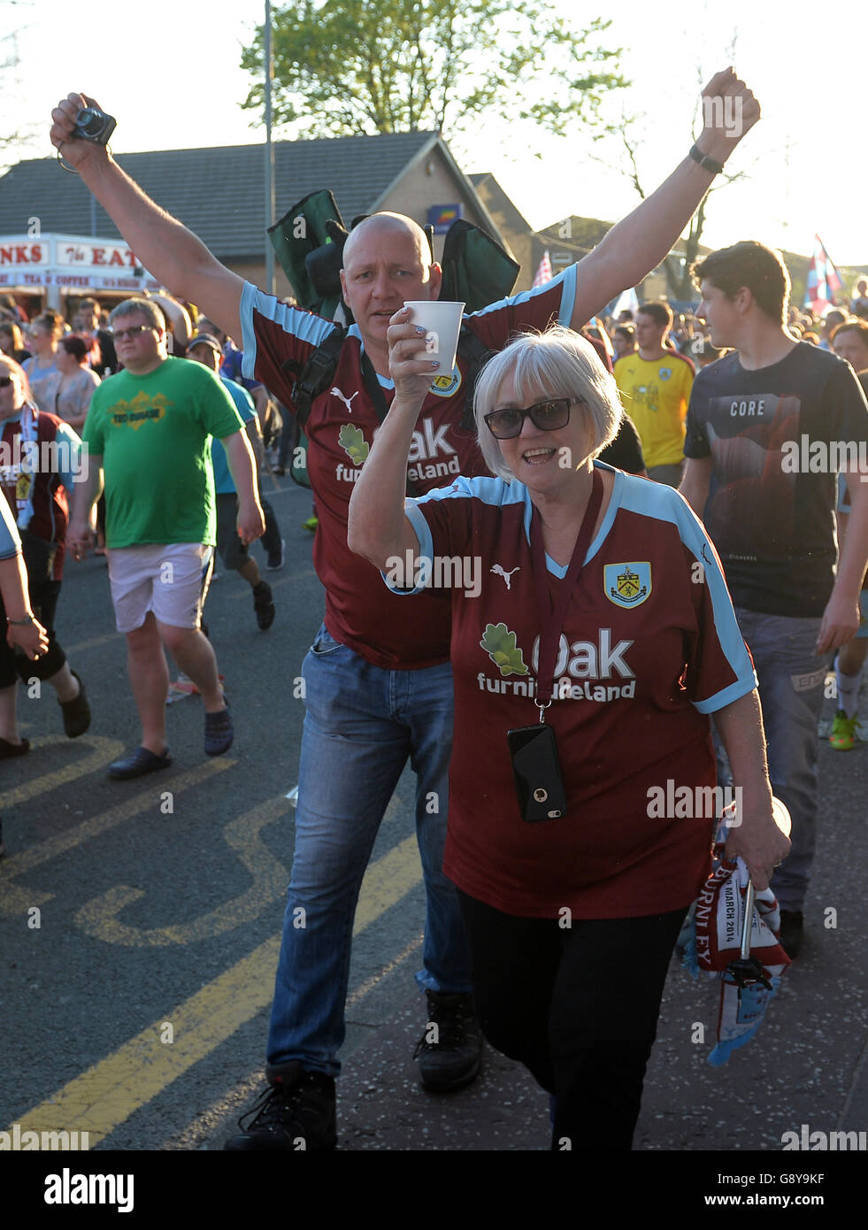 Burnley fans celebrates after the team's Championship Champions bus ...