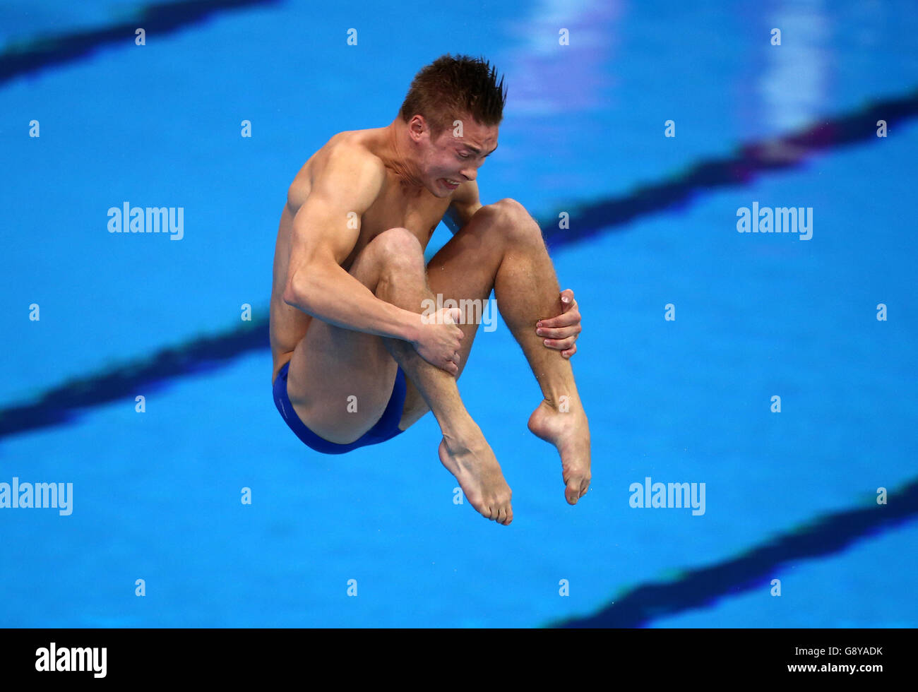 Finland's Jouni Kallunki competes in the 1m Men Springboard Preliminary ...