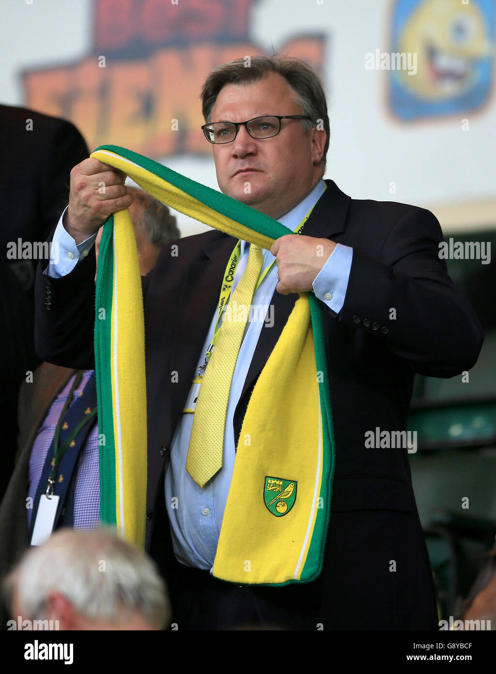 Norwich City fan Ed Balls takes off his scarf following confirmation of ...