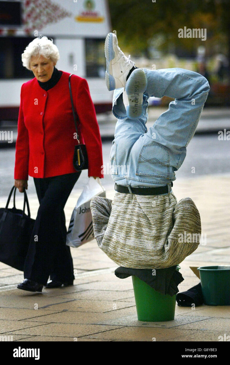 Man head in bucket edinburgh hi-res stock photography and images - Alamy