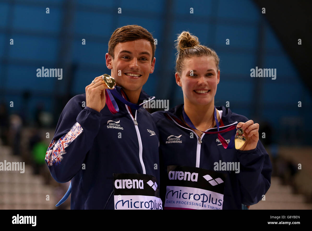 Great Britain's Tom Daley and Grace Reid celebrate with their gold ...