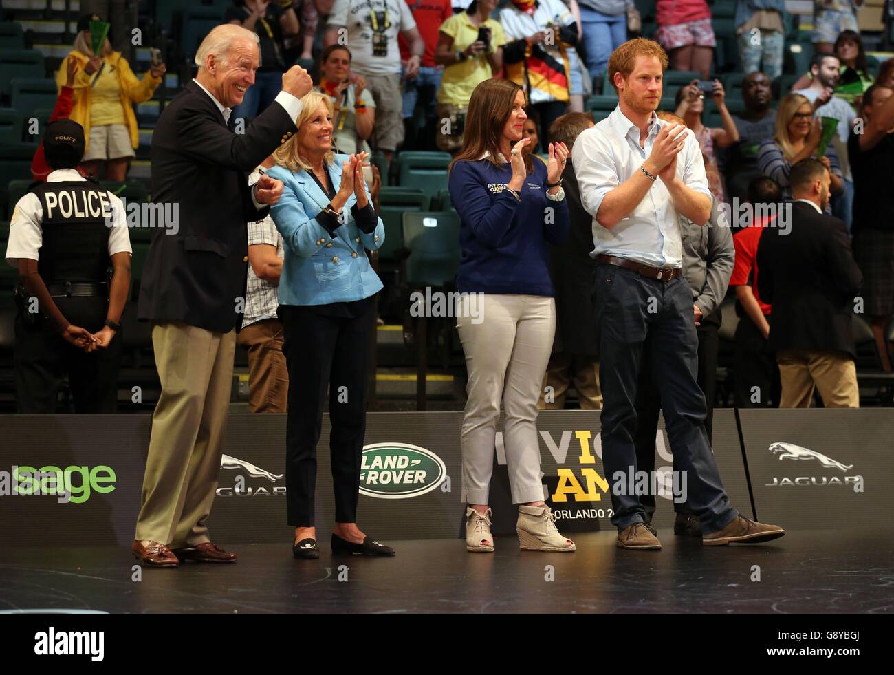 Prince Harry (right) stands with Amanda Chick (second right), General ...