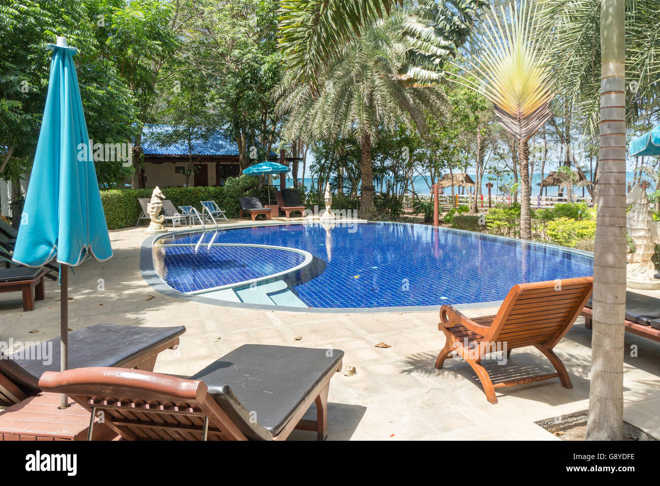 Small hotel swimming pool Stock Photo - Alamy
