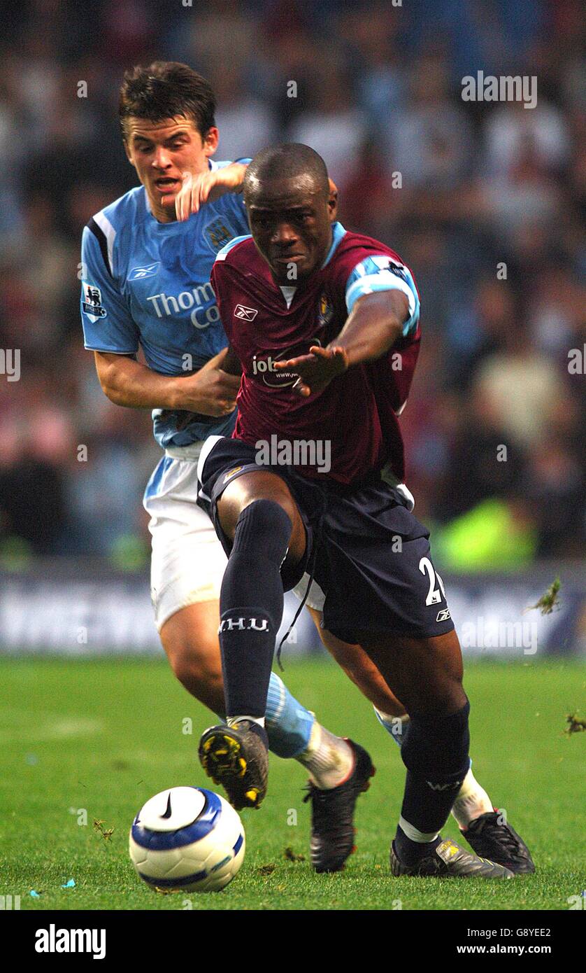 Manchester City's Joey Barton (l) and West Ham United's Nigel Reo-Coker ...