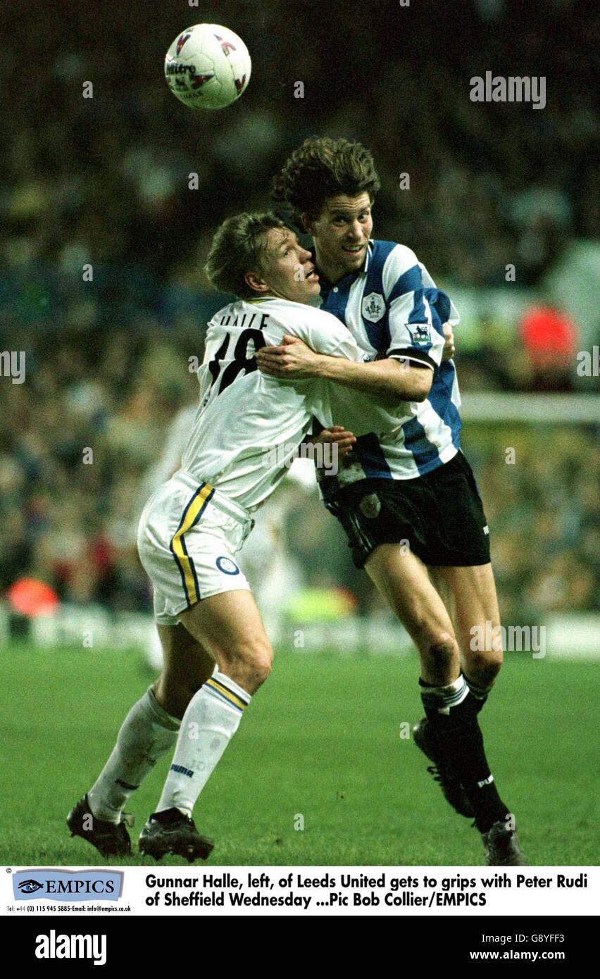 Gunnar Halle, left, of Leeds United gets to grips with Peter Rudi of ...