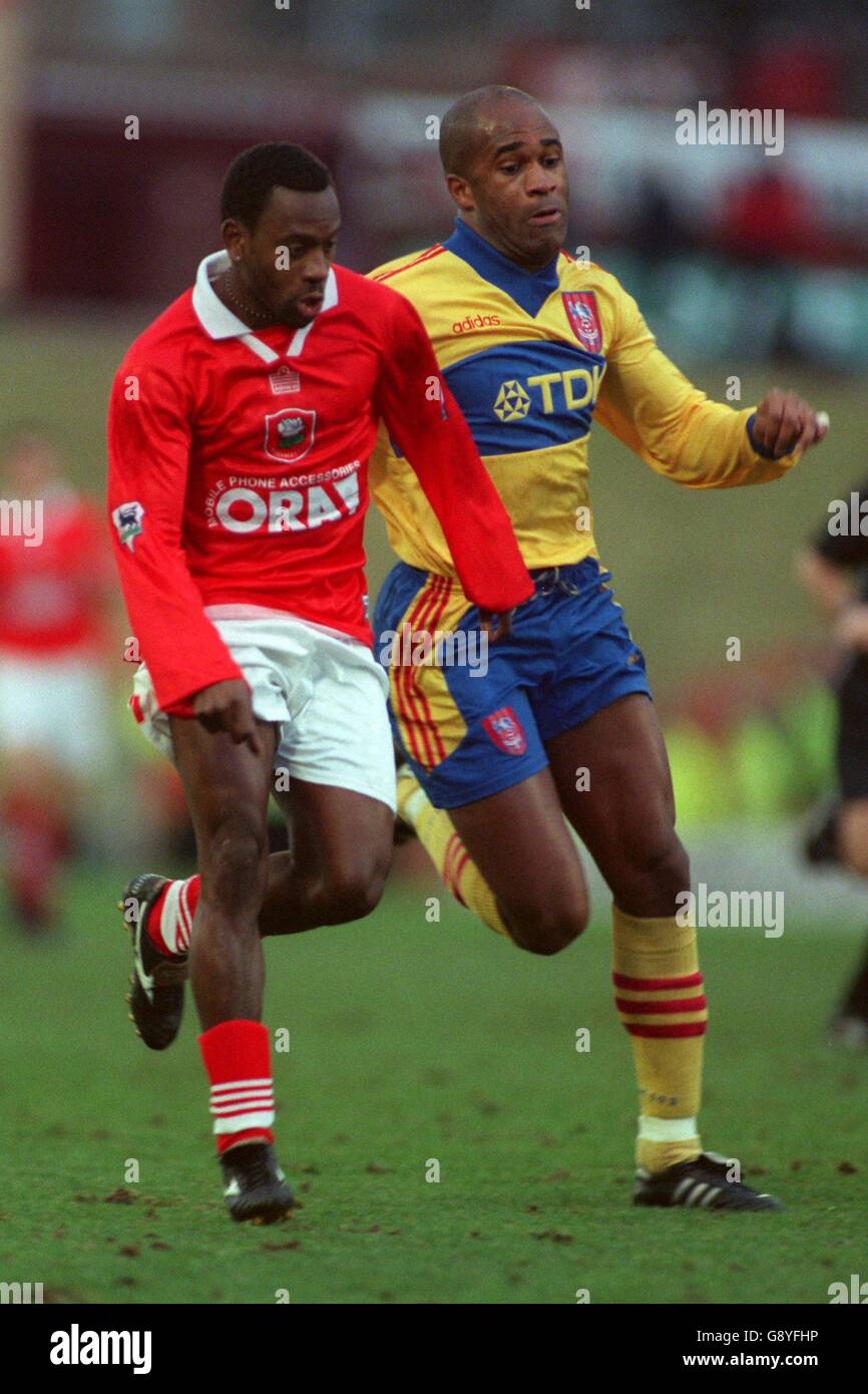 Barnsley's Clint Marcelle and Crystal Palace's Dean Gordon battle for ...