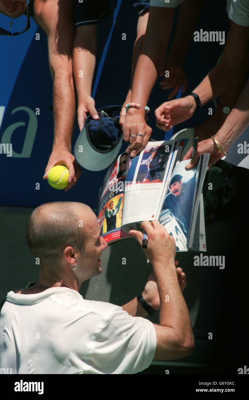 Tennis - Ford Australian Open - Melbourne. Andre Agassi signs ...