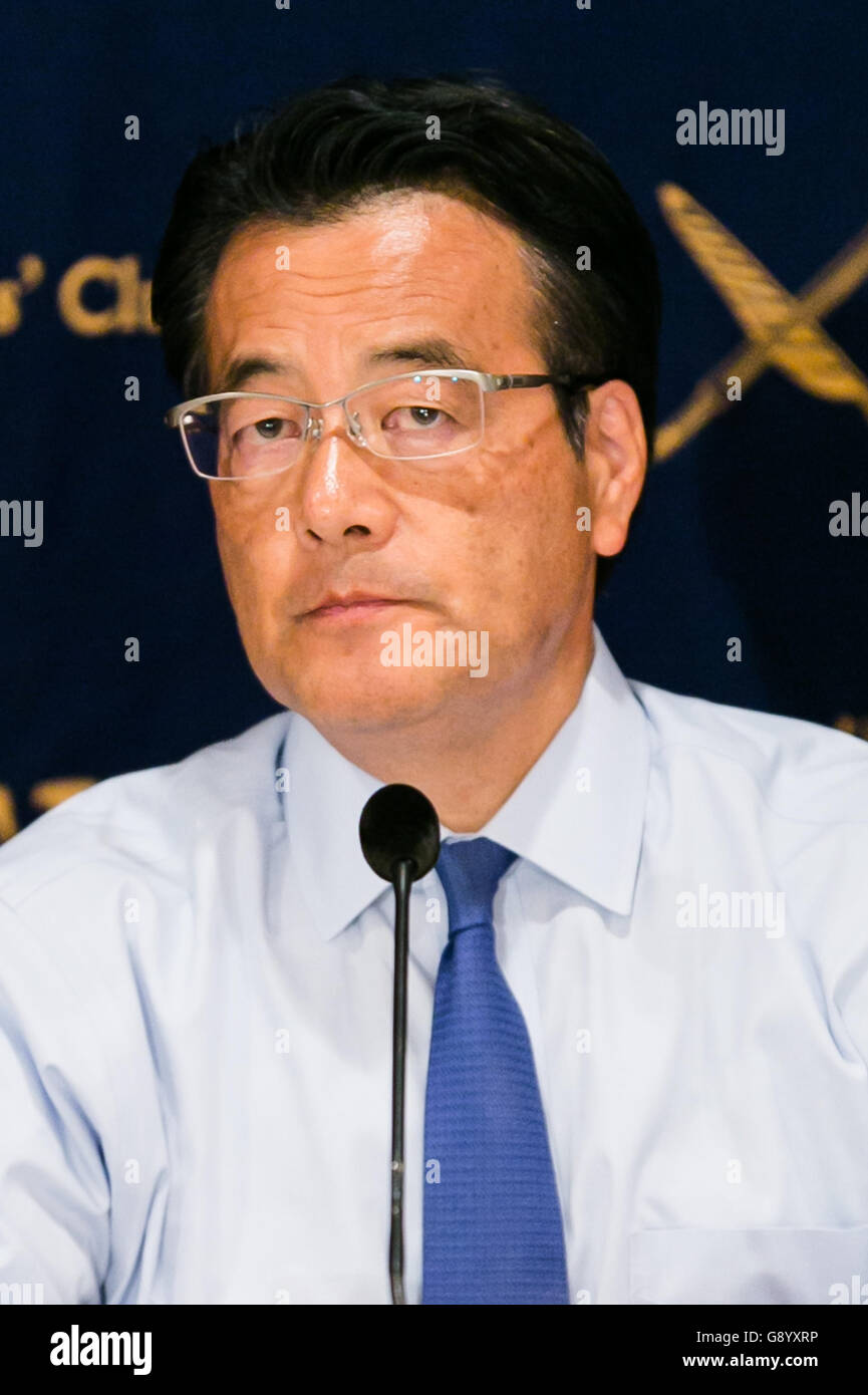 Katsuya Okada, leader of the main opposition Democratic Party (DP ...