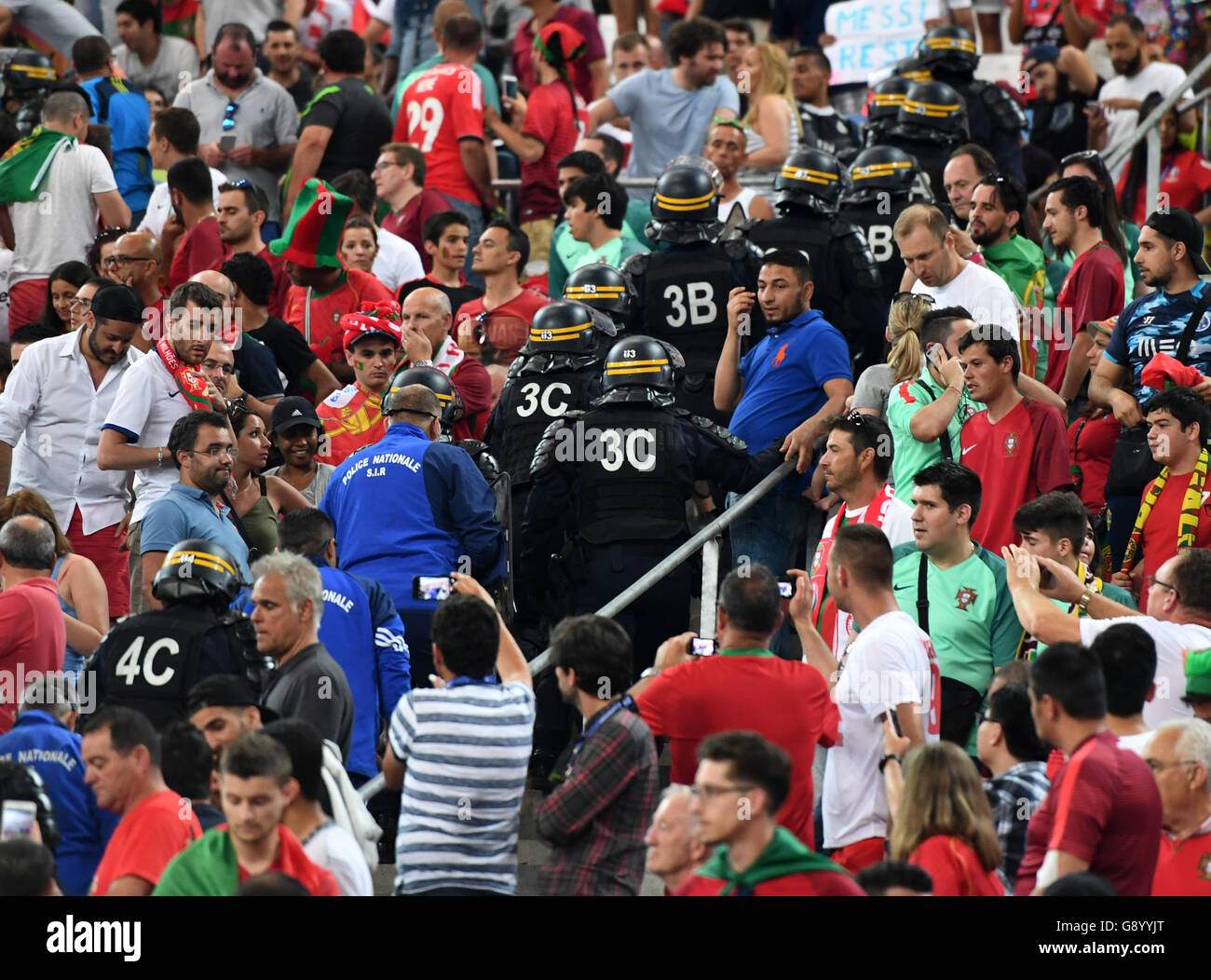 French riot police climb up the stairs in the stands during the UEFA ...