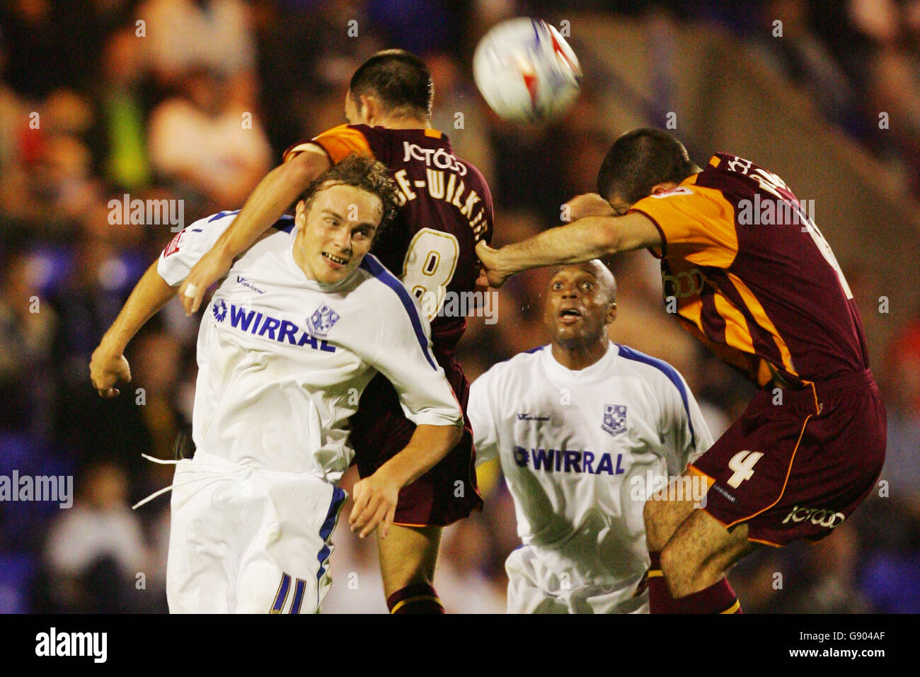 Tranmere Rovers and Bradford City players fight for the ball Stock ...