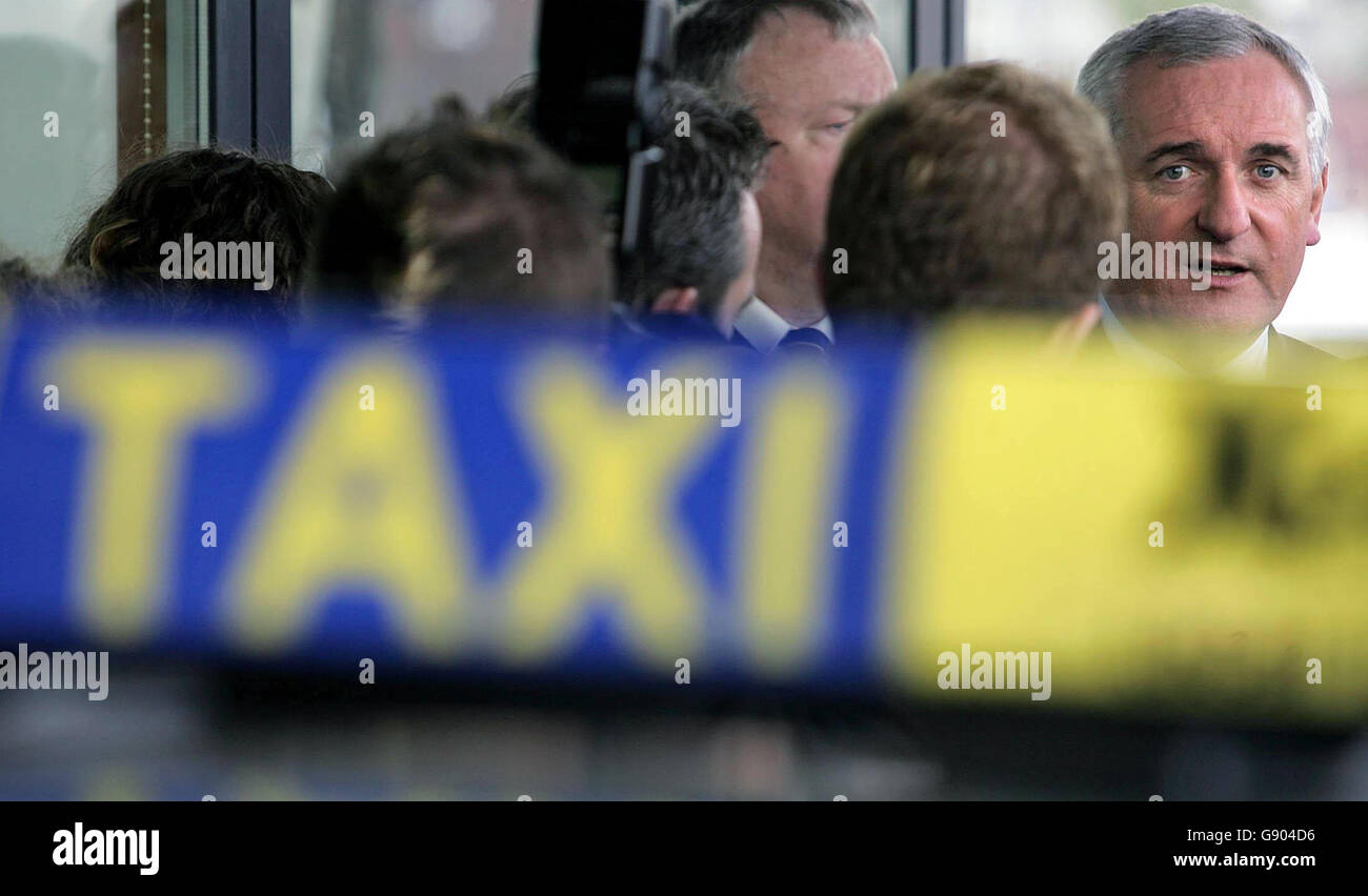 An Taoiseach Bertie Ahern stands outside the Ocean Bar, Dublin, Monday ...
