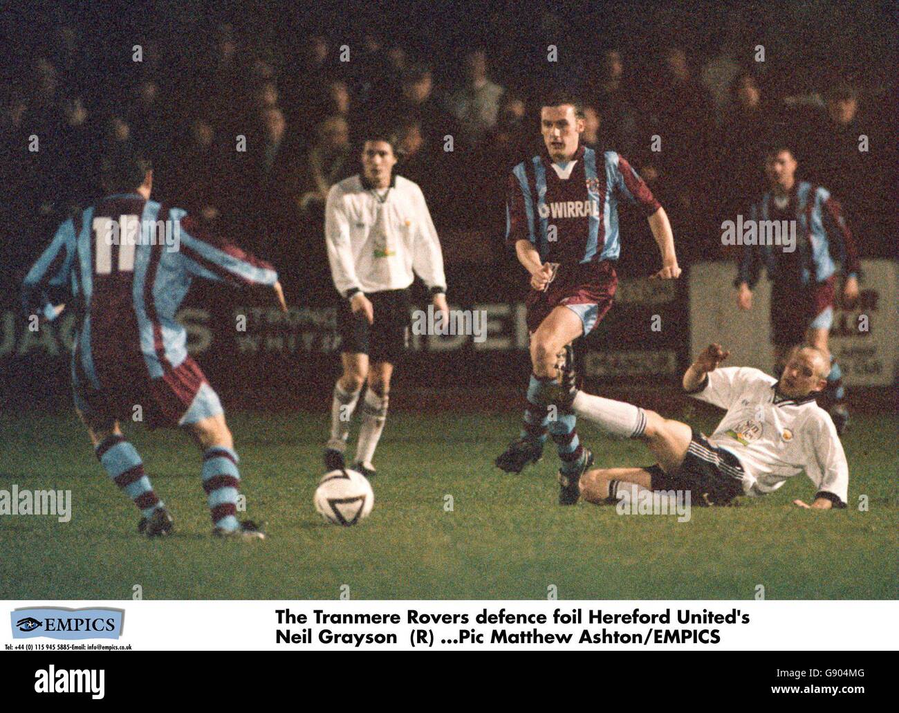 The Tranmere Rovers defence foil Hereford United's Neil Grayson (right ...