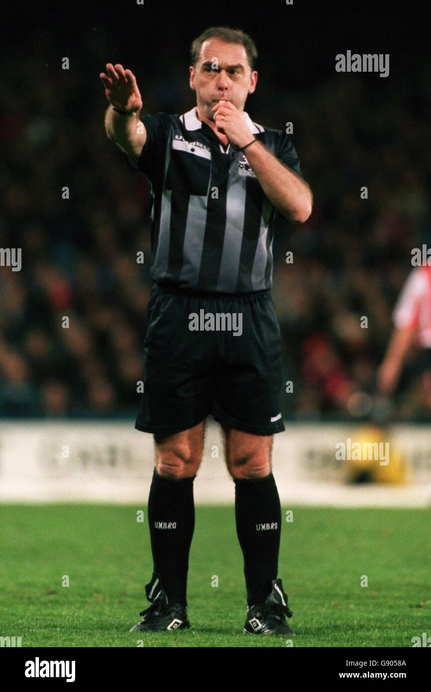 Referee mike reed awards a free kick hi-res stock photography and ...