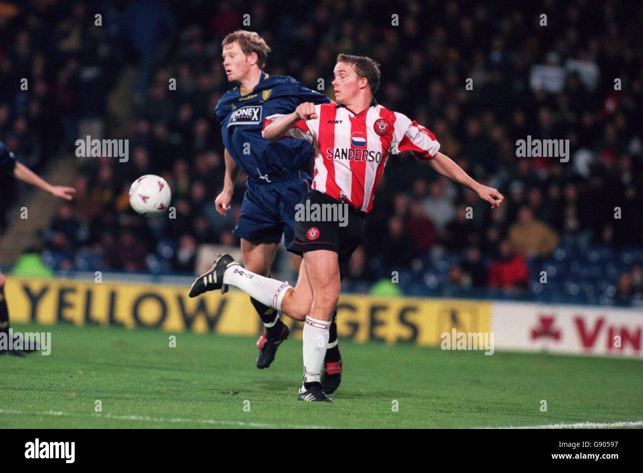 Kevin Davies of Southampton (right) and Ben Thatcher of Wimbledon ...