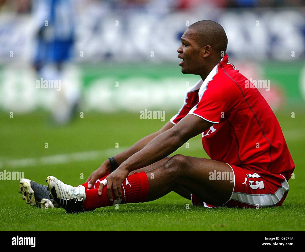 Fulham's Collins John looks back at the referee after not being awarded ...