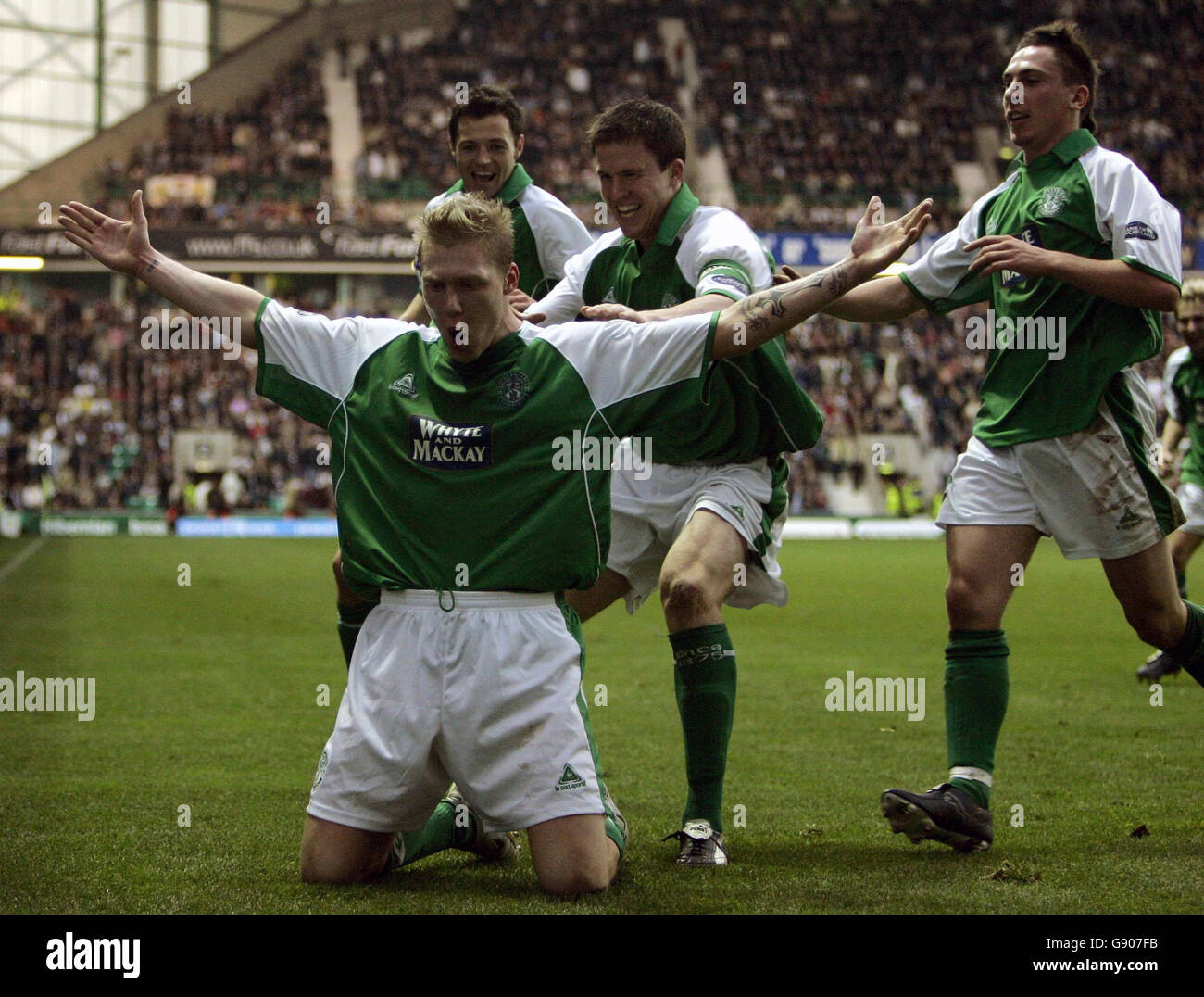 Hibernian's Garry O'Connor (L) celebrates scoring against Hearts during ...