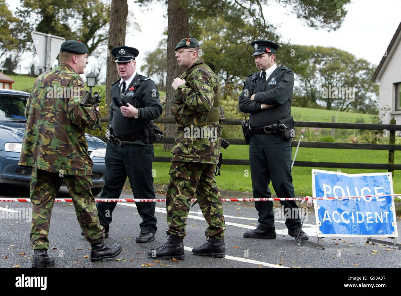 Police and soldiers seal off a road near Keady, in County Armagh ...