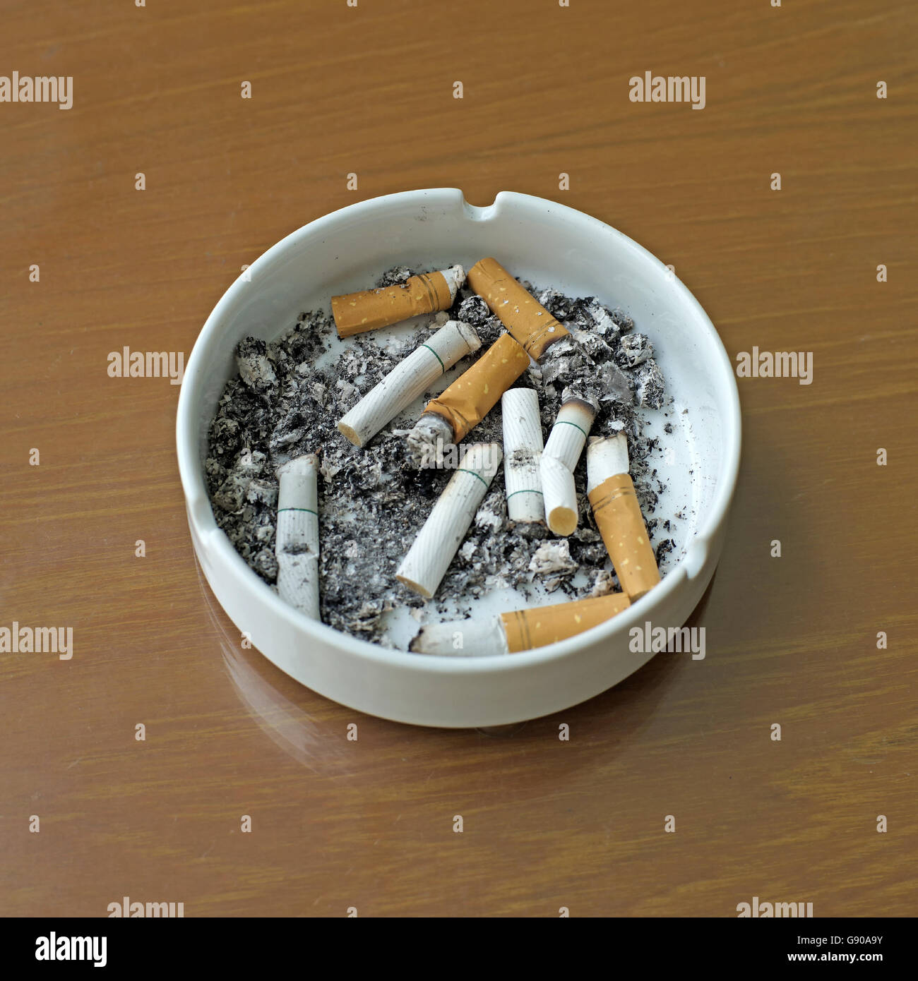 Cigarettes in ashtray on white hi-res stock photography and images - Alamy