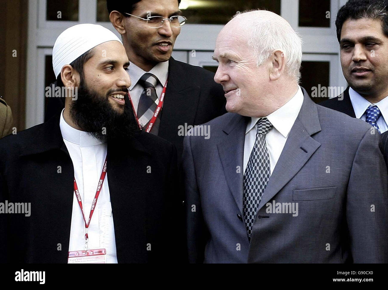 Defence Secretary John Reid (right) chats with Imam Asim Hafiz, Muslim ...