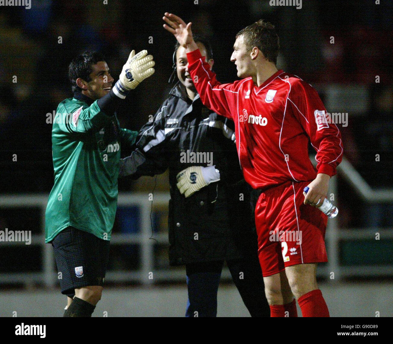 Rushden & Diamonds' goalkeeper Jamie Young (L) celebrates with team ...