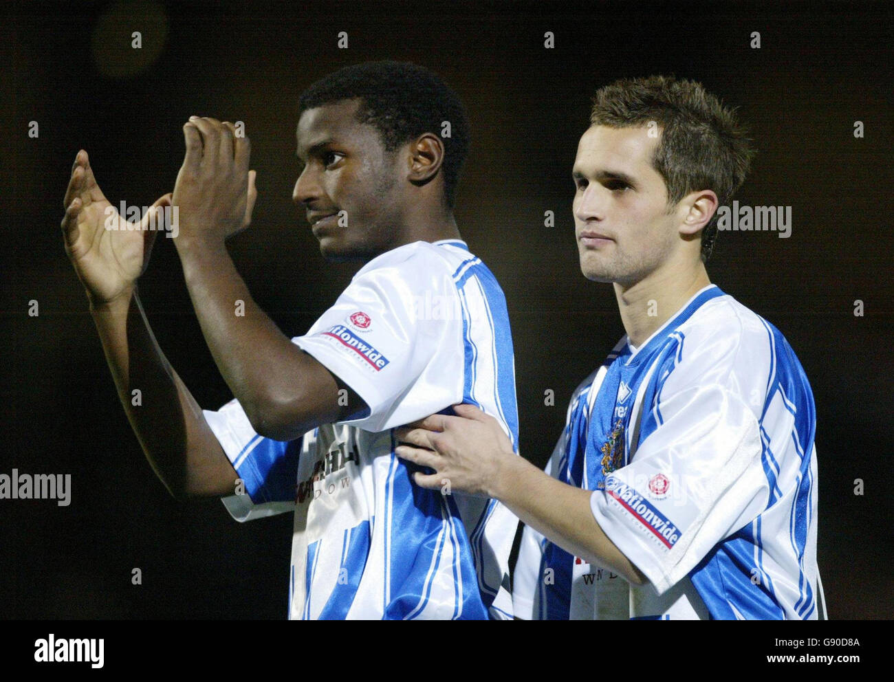 Halifax Town's Tyrone Thompson (L) thanks the fans after losing the FA ...