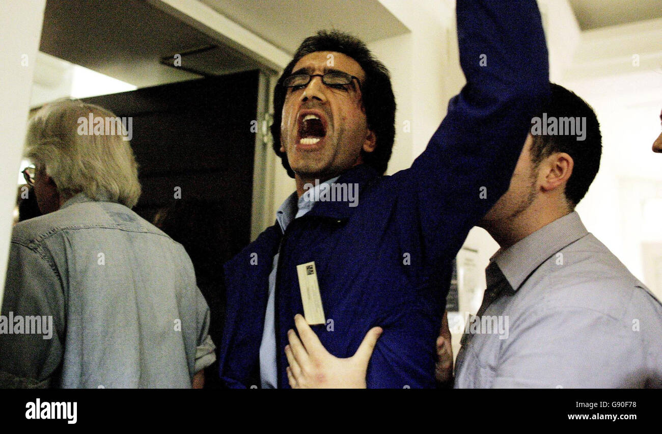 A man heckles the Iranian ambassador Dr Seyed Mohammed Hossein Adeli during his address to the ...