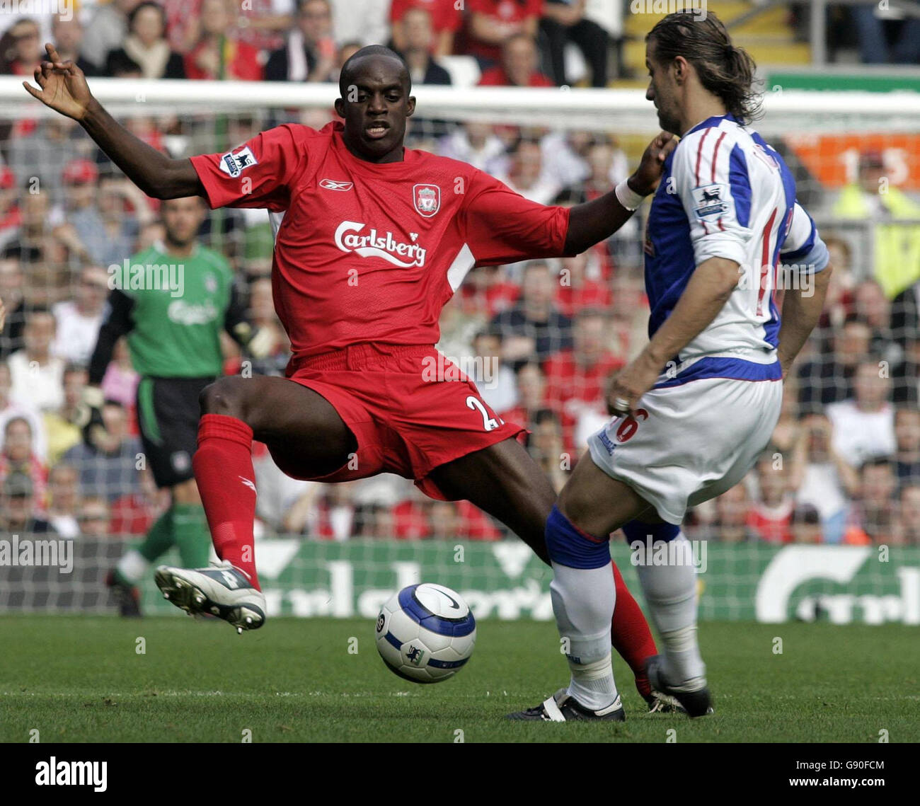 Liverpool's Mohamed Sissoko (L) challenges Blackburn's Kerimoglu Tugay ...