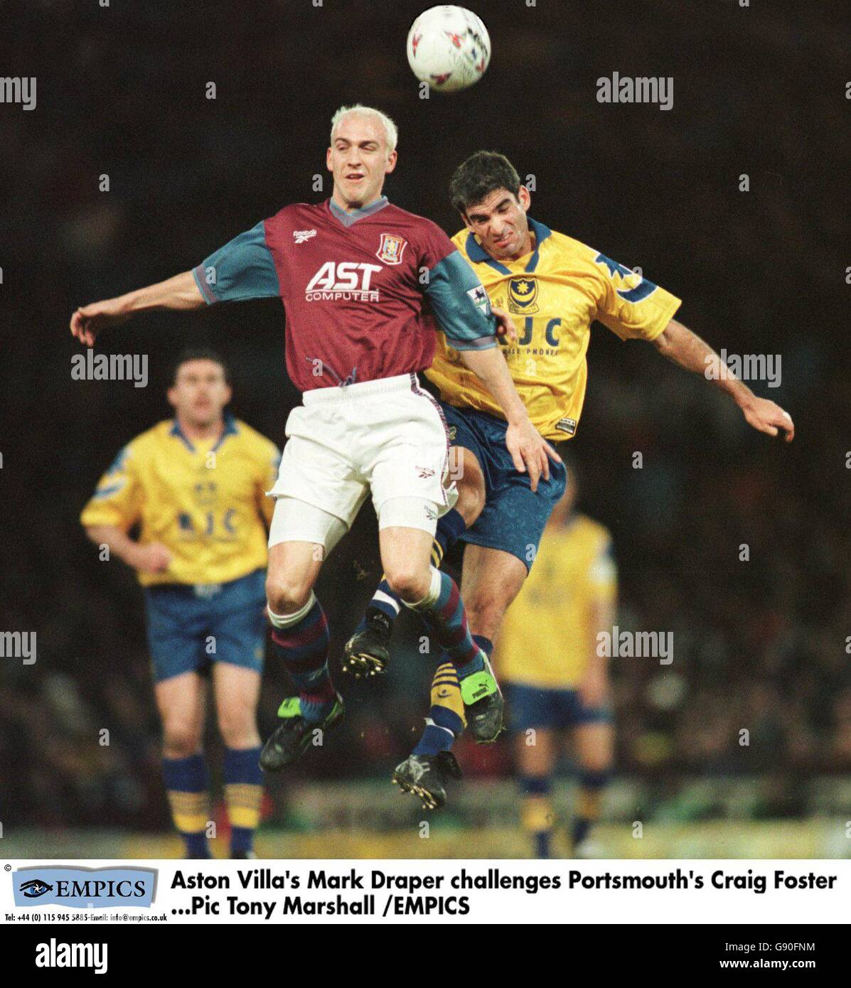 Two action full front view header claret yellow ast football hi-res ...