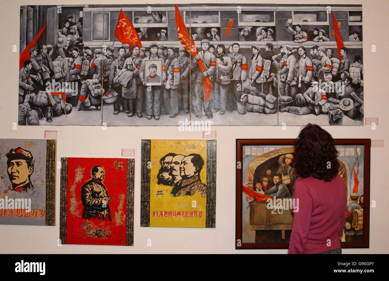 A visitor inspects the work of Chinese artist Cai Yi Lin at the ...