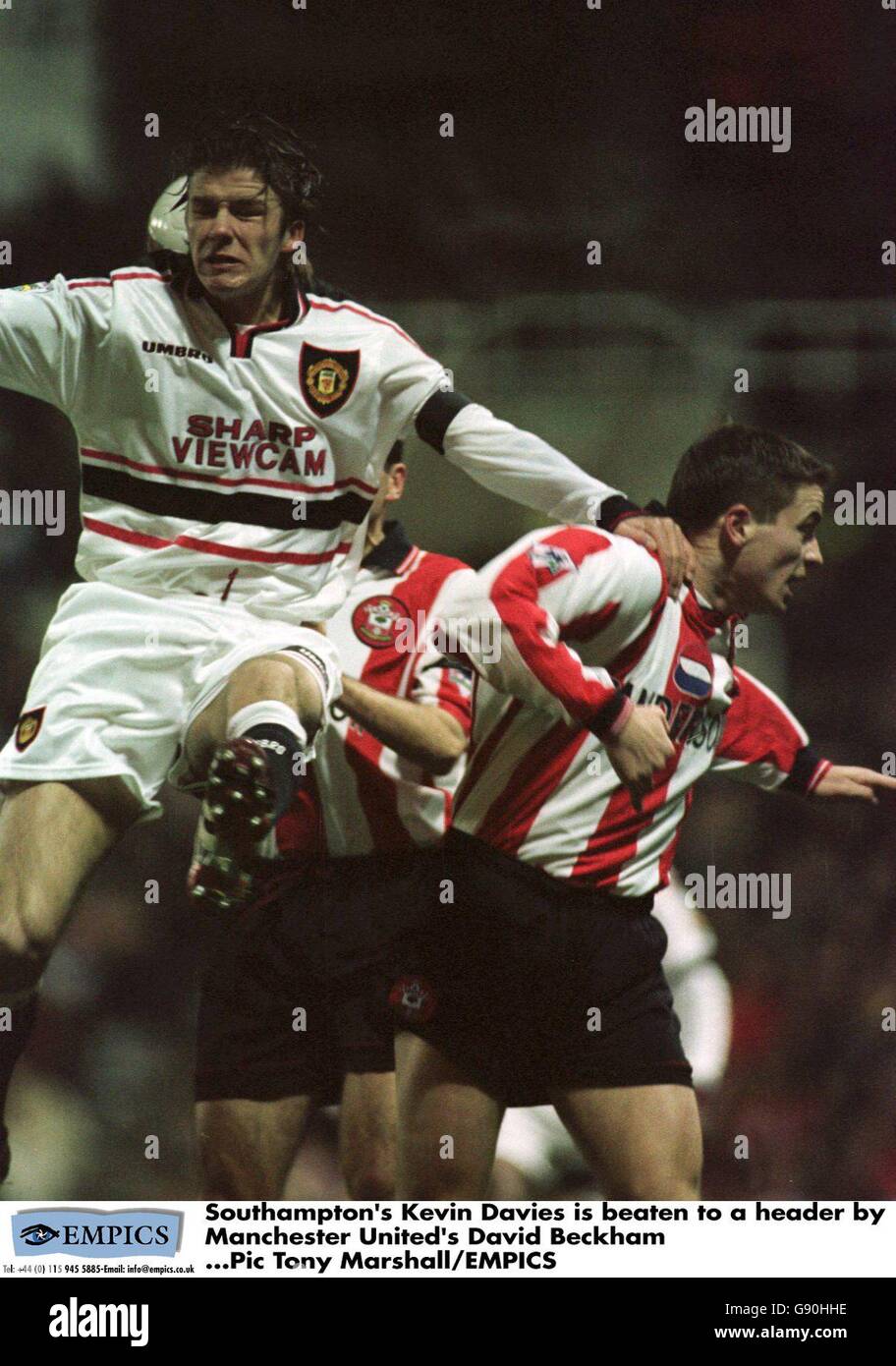Southampton's Matthew Oakley (right) is beaten to a header by ...