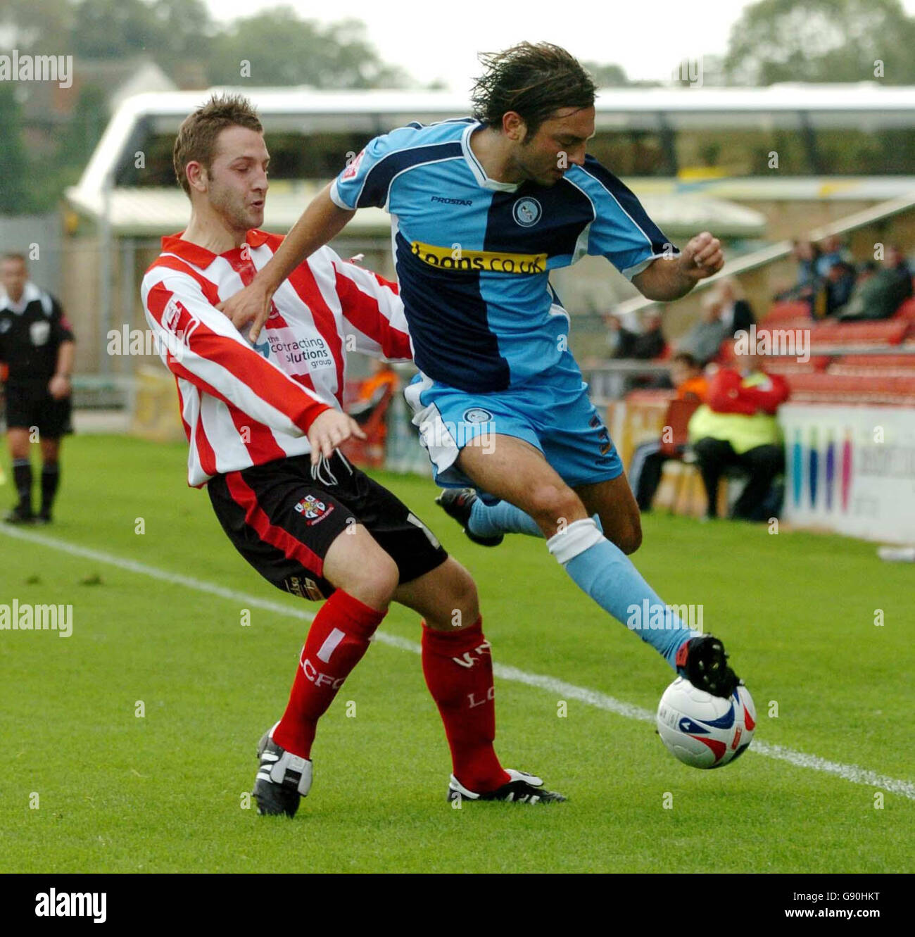 Lincoln's Scott Kerr (L) in action with Wycombe's Clint Easton during ...