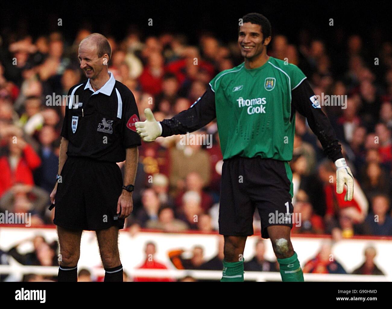 Referee Mike Riley shares a joke with Manchester City goalkeeper David ...