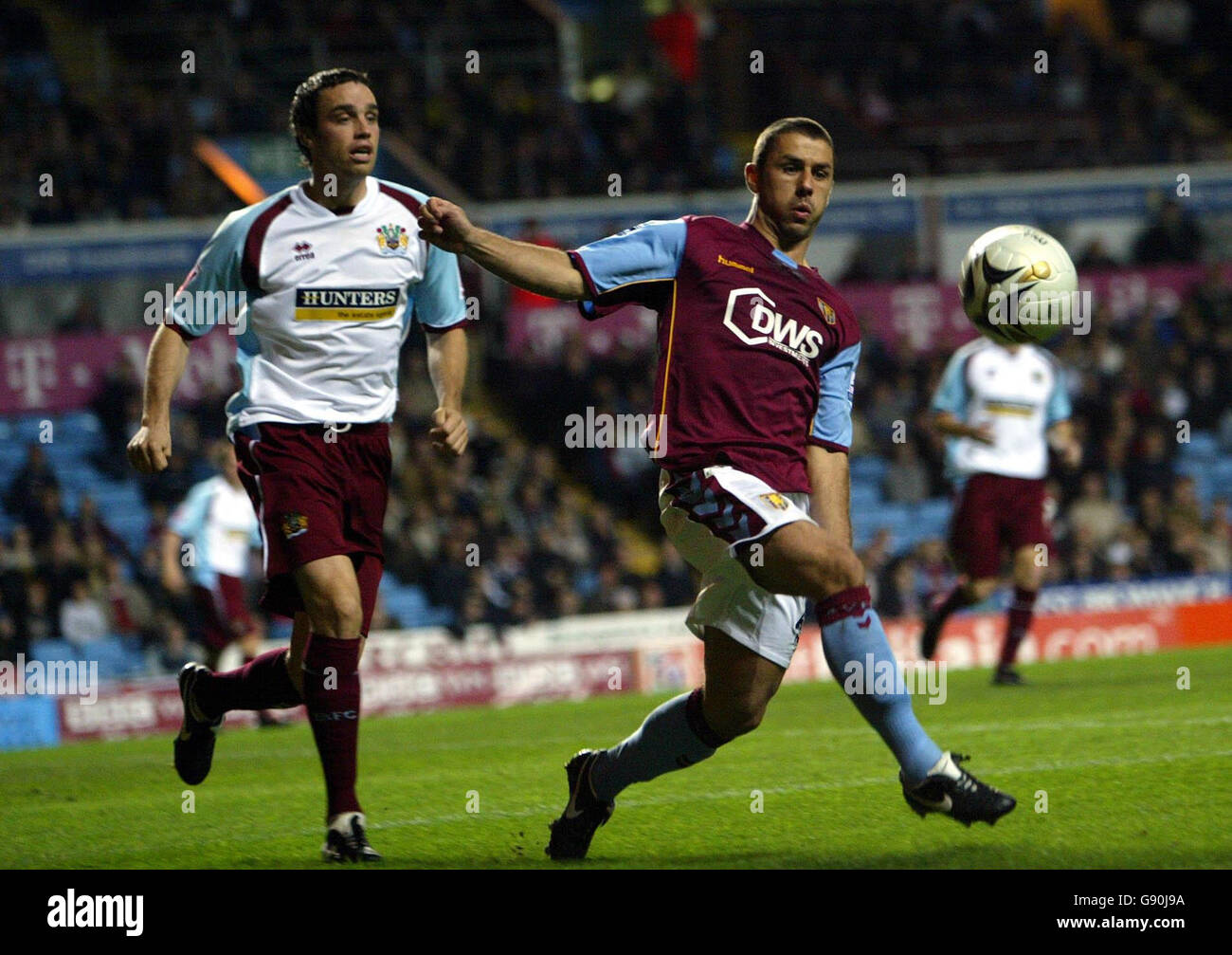 Aston Villa's Kevin Phillips under pressure from Burnley's Michael Duff ...