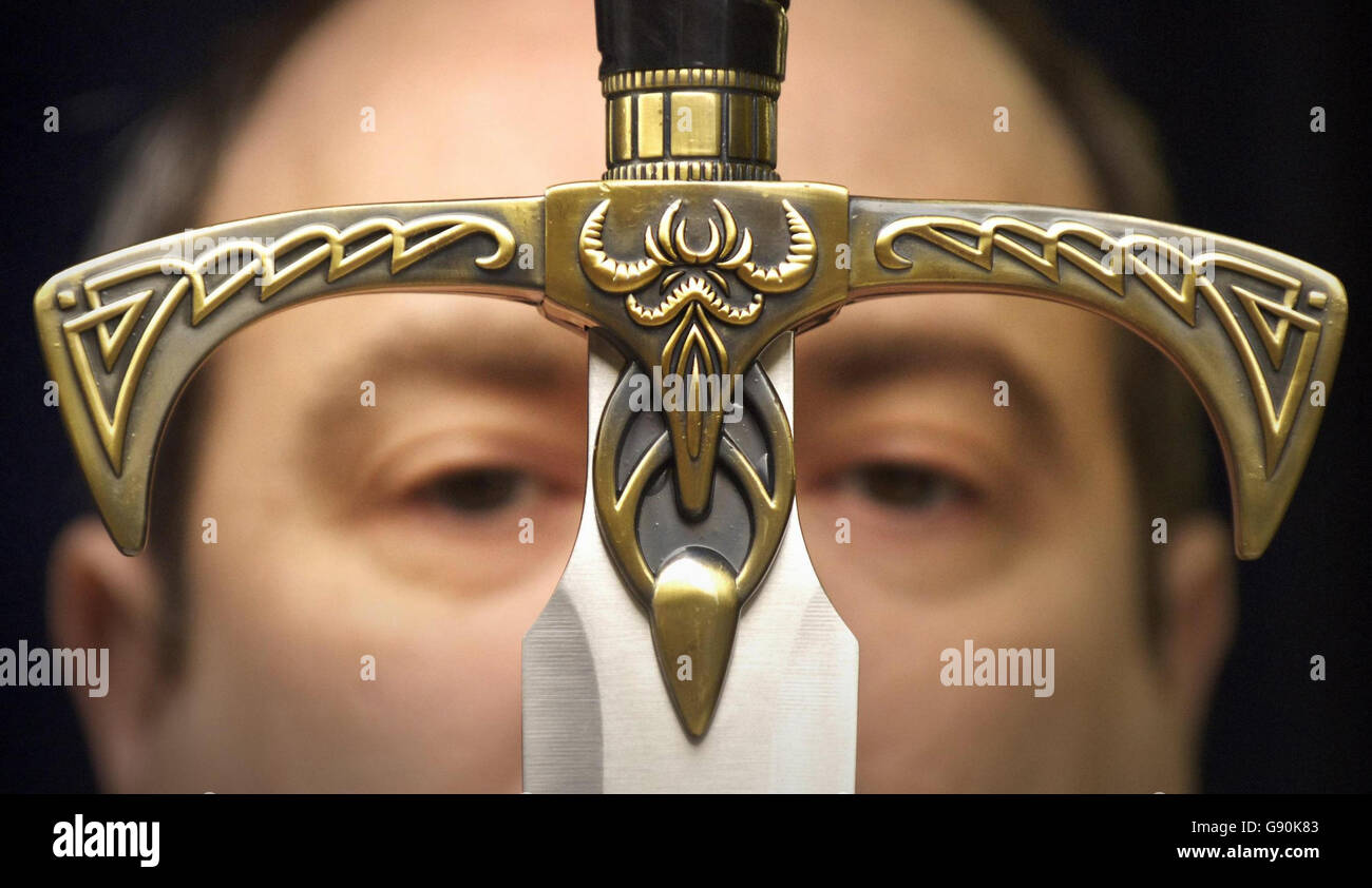 Martin morris with replica sword in his shop victor morris hi-res stock ...