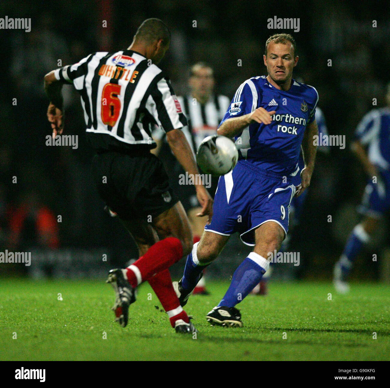 Newcastle United's Alan Shearer (R) battles with Grimsby Town's Justin ...