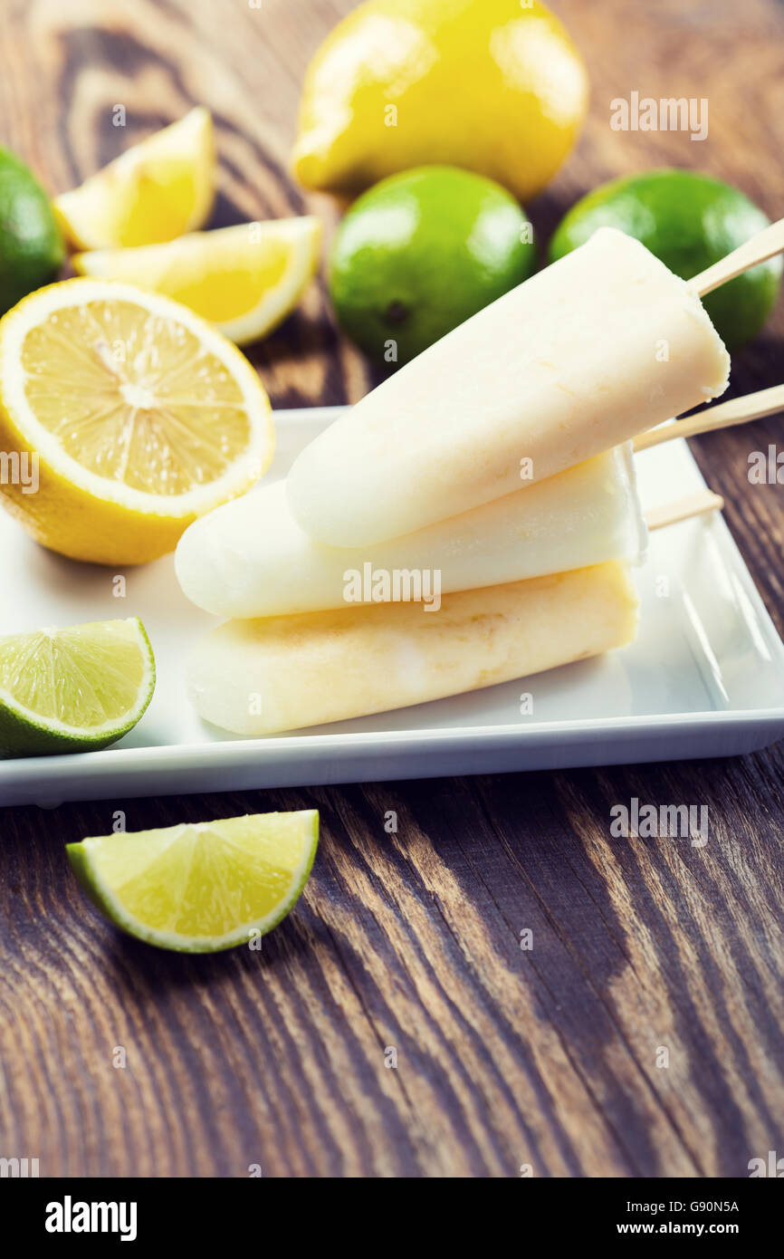 Homemade lime and lemon juice ice pops Stock Photo - Alamy