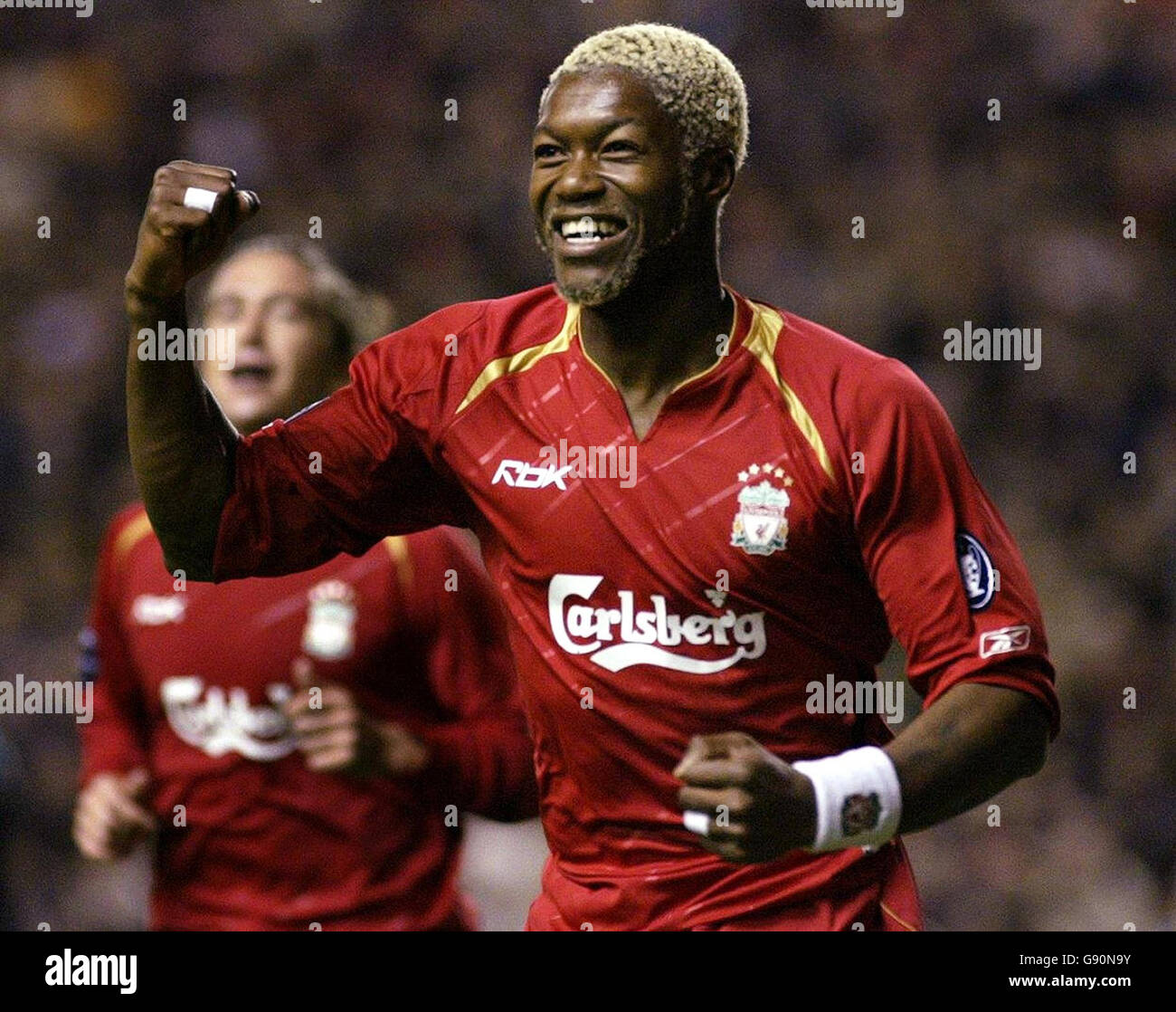 Liverpools djibril cisse celebrates his goal hi-res stock photography ...