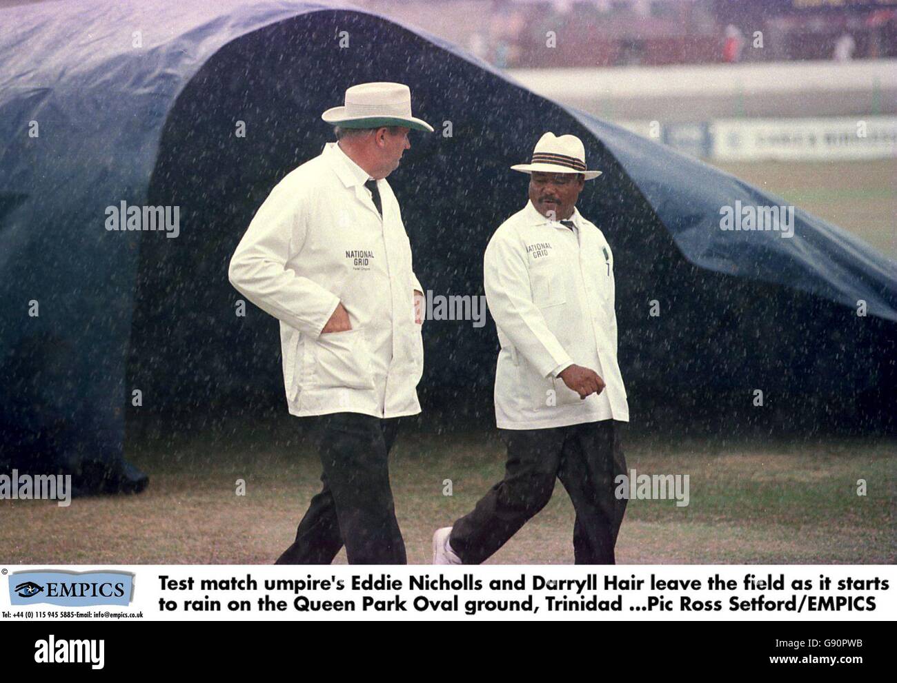 Test match umpires Eddie Nicholls (right) and Darrell Hair (left) leave ...