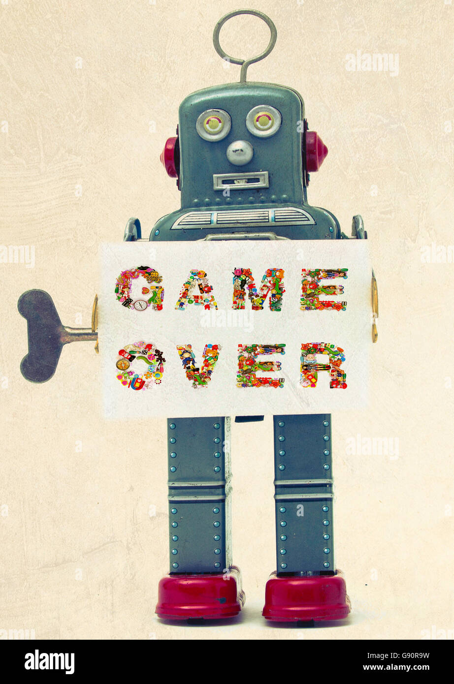 robot holing a sign game over Stock Photo - Alamy