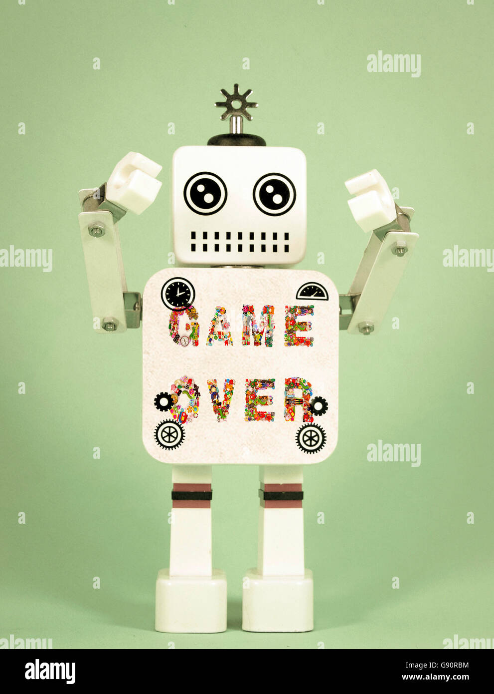 robot holing a sign game over Stock Photo - Alamy
