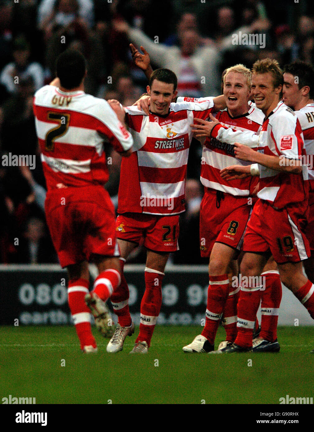 Doncaster Rovers' Michael McIndoe (21) celebrates scoring their third ...