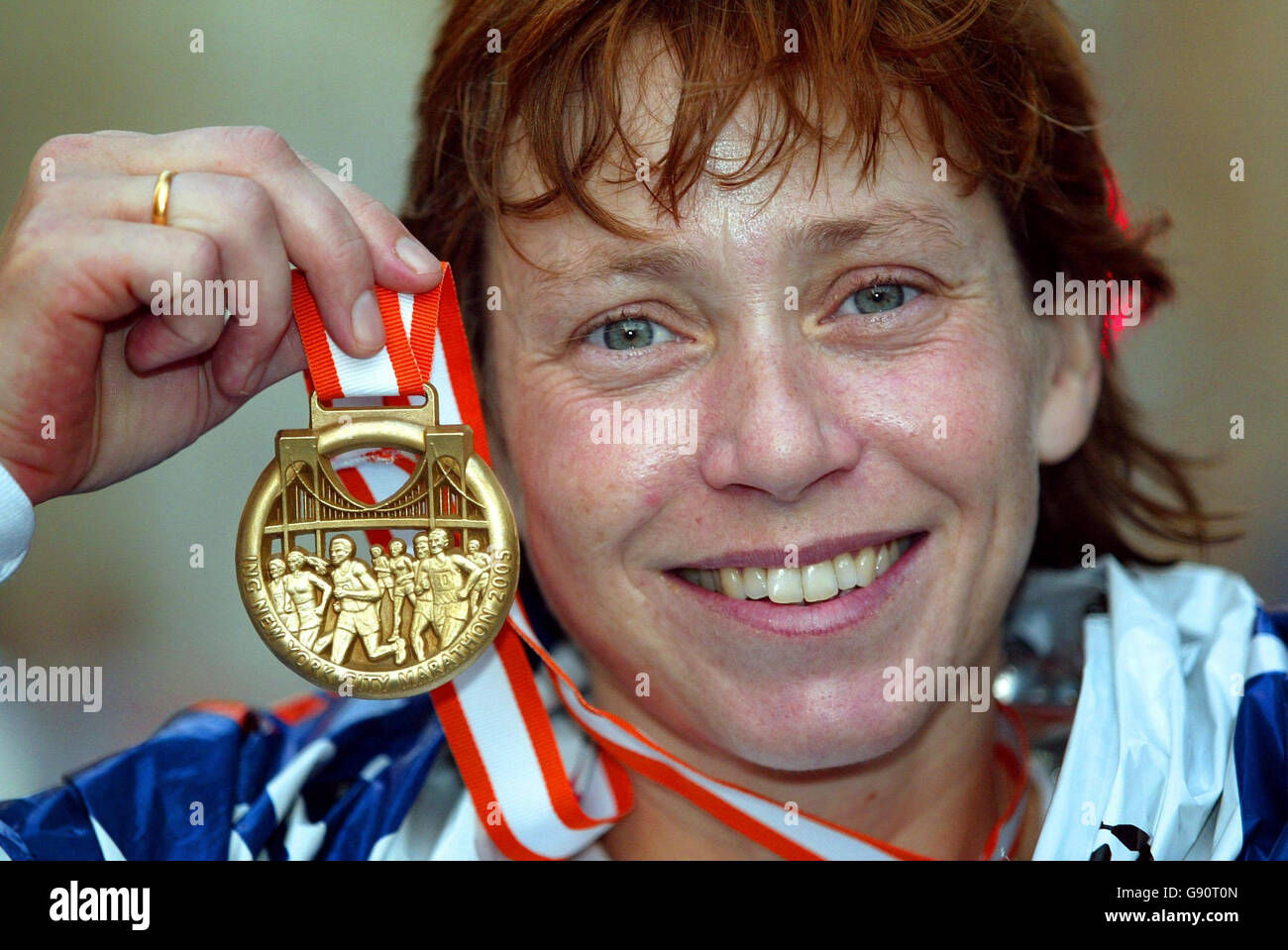 Cancer sufferer Jane Tomlinson from Leeds celebrates completing her ...