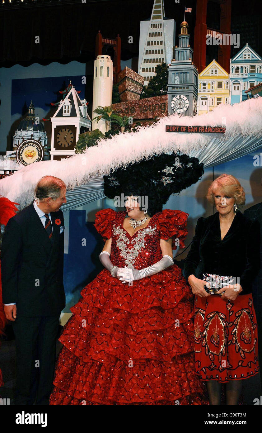The Prince of Wales and the Duchess of Cornwall stand with Val Diamond ...