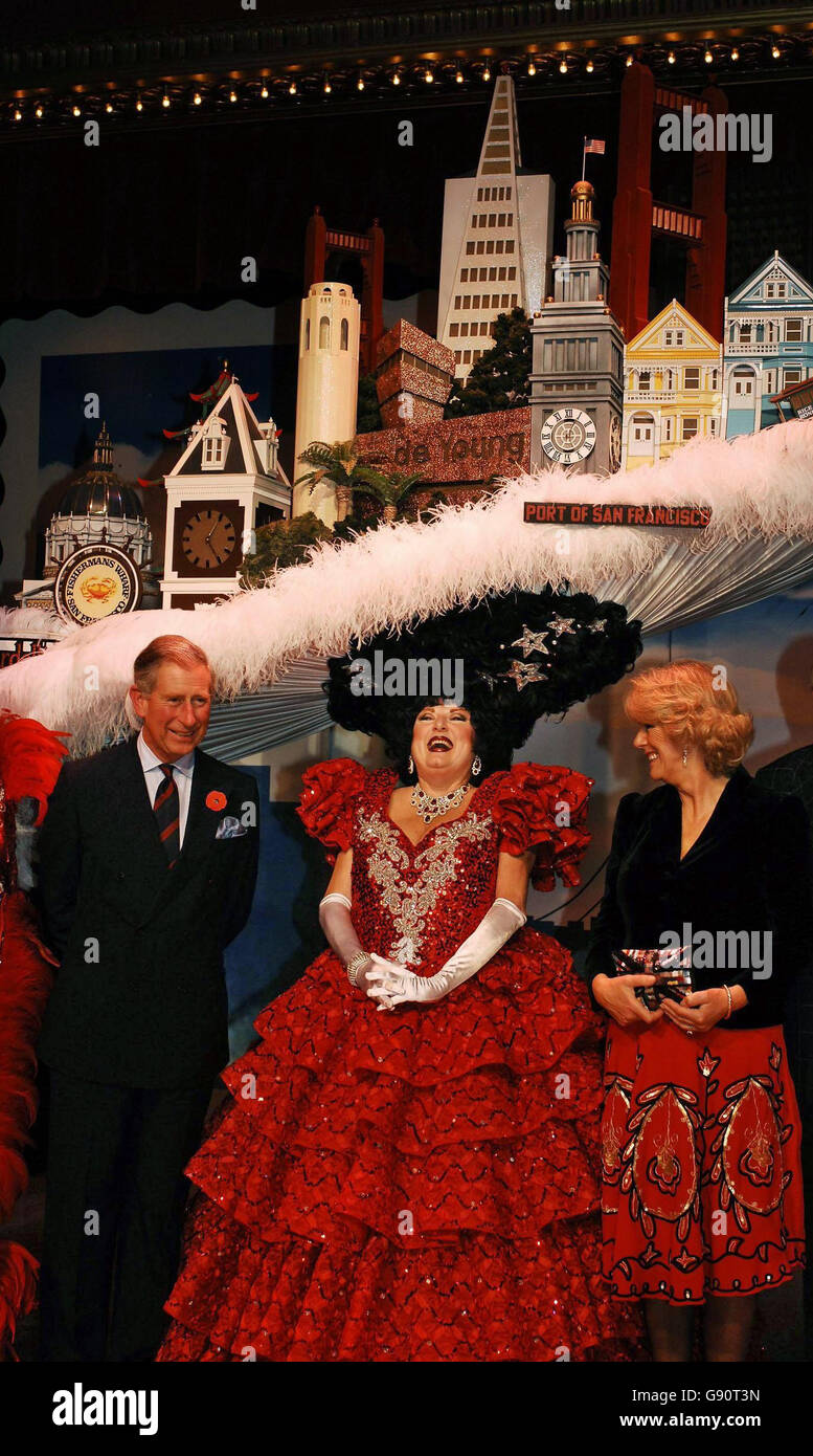 The Prince of Wales and the Duchess of Cornwall stand with Val Diamond ...